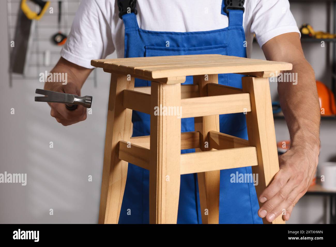 Professional repairman wooden stool hi-res stock photography and images ...