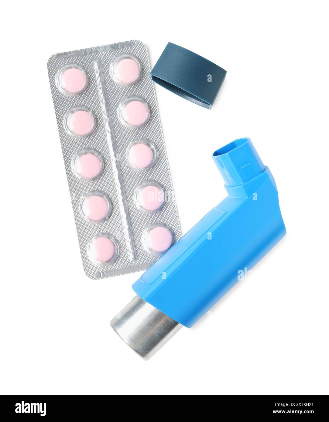 Asthma treatment. Inhaler and pills isolated on white, top view Stock ...