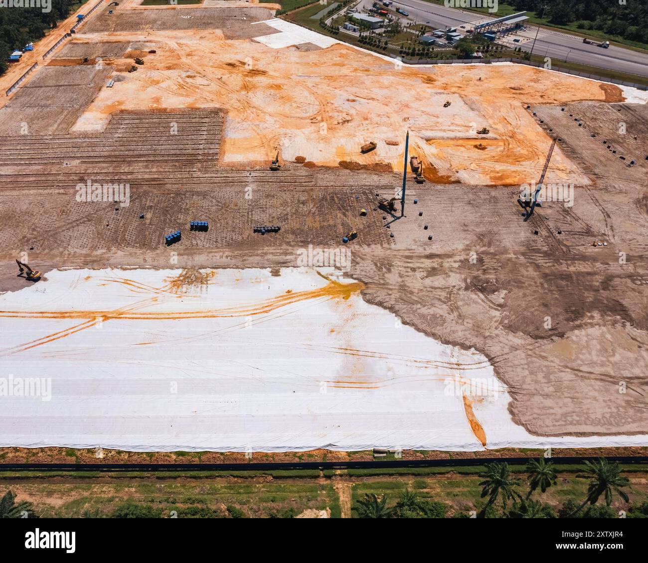 A bird's-eye view of a massive construction site that is currently ...