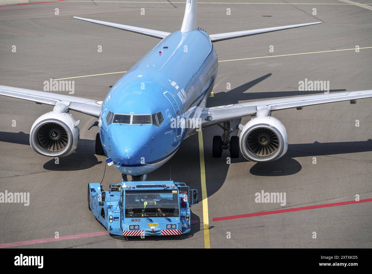Boeing 737-800 from KLM, being driven from the terminal onto the apron ...