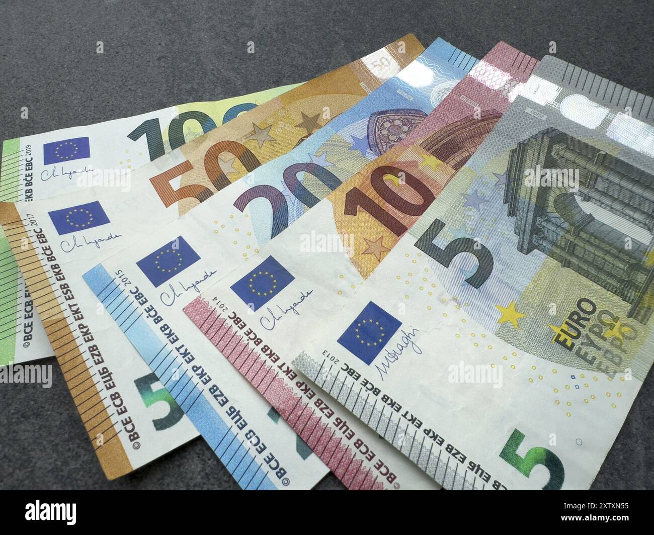 Symbol photo Cash Banknotes euro banknotes lying fanned out on top of ...