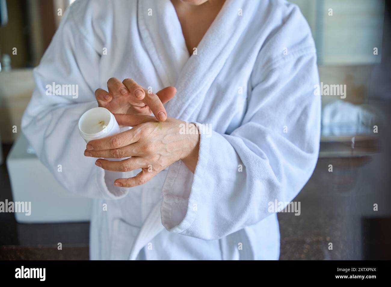 Female hand putting hotel room hi-res stock photography and images - Alamy