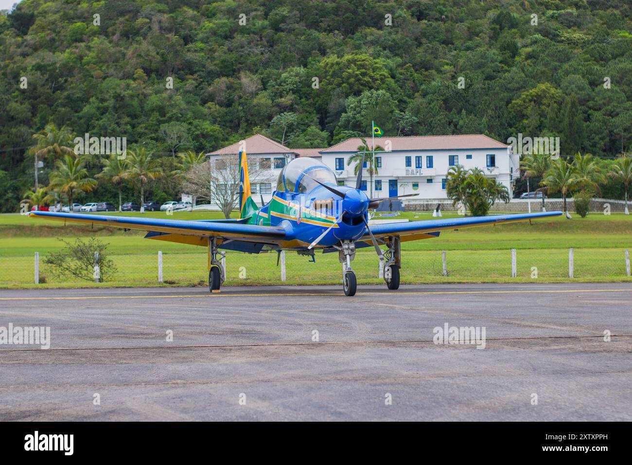 A stunning photograph of an aerobatic aircraft on the runway ...
