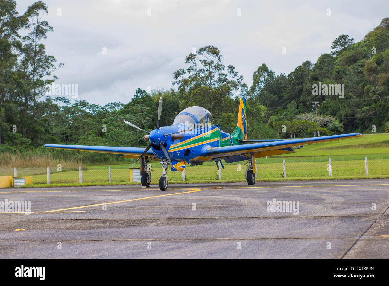 A stunning photograph of an aerobatic aircraft on the runway ...