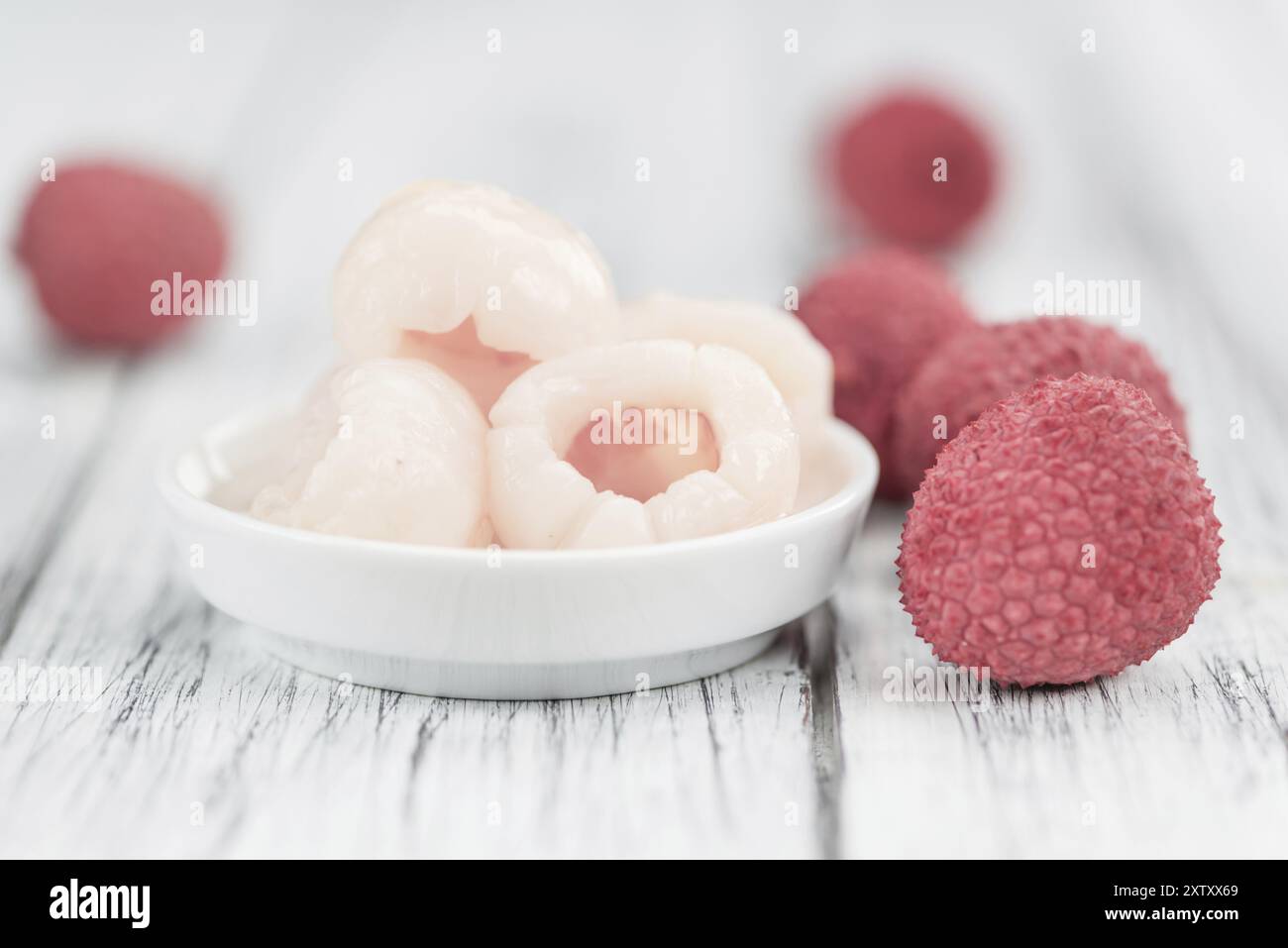 Fresh made Lychees (preserved) on a vintage background (close-up shot ...