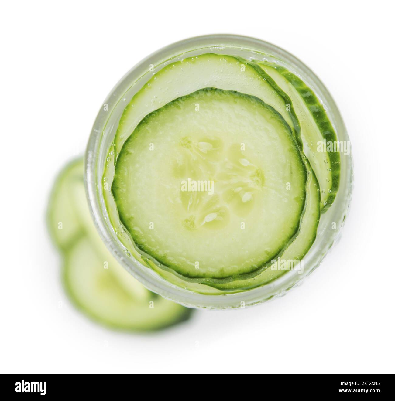 Portion of Cucumber Water as detailed close-up shot isolated on white ...
