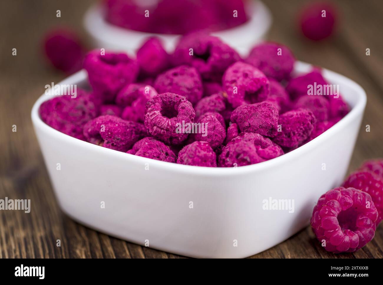 Dried Raspberries on a vintage background as detailed close-up shot ...