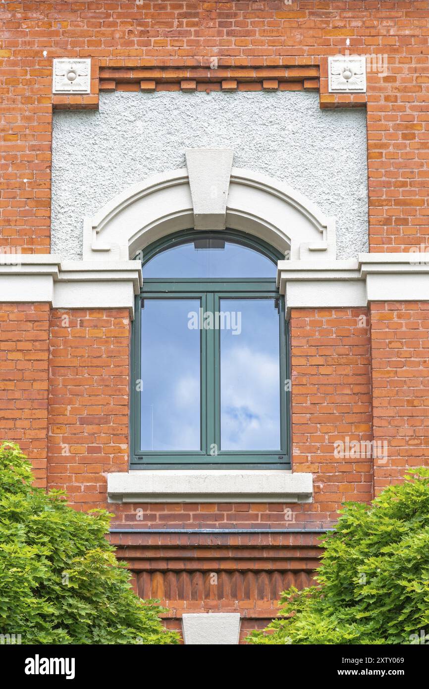 Brick facade of a refurbished industrial building Stock Photo - Alamy