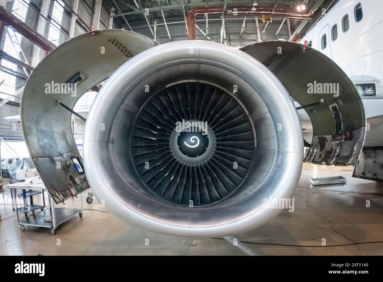 Close-up of an open high bypass turbofan aircraft engine of a passenger ...