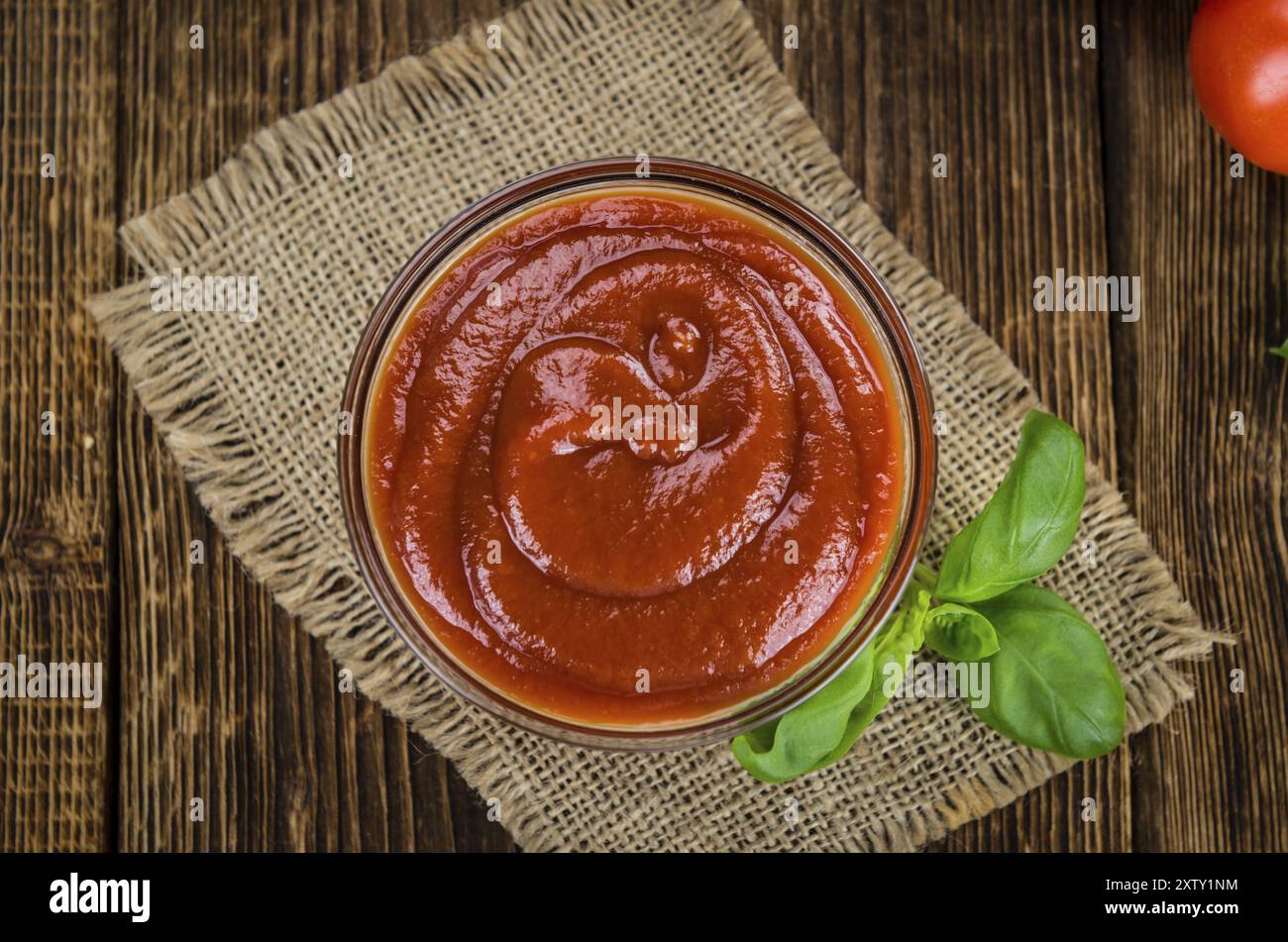 Fresh made Ketchup on a vintage background (close-up shot Stock Photo ...