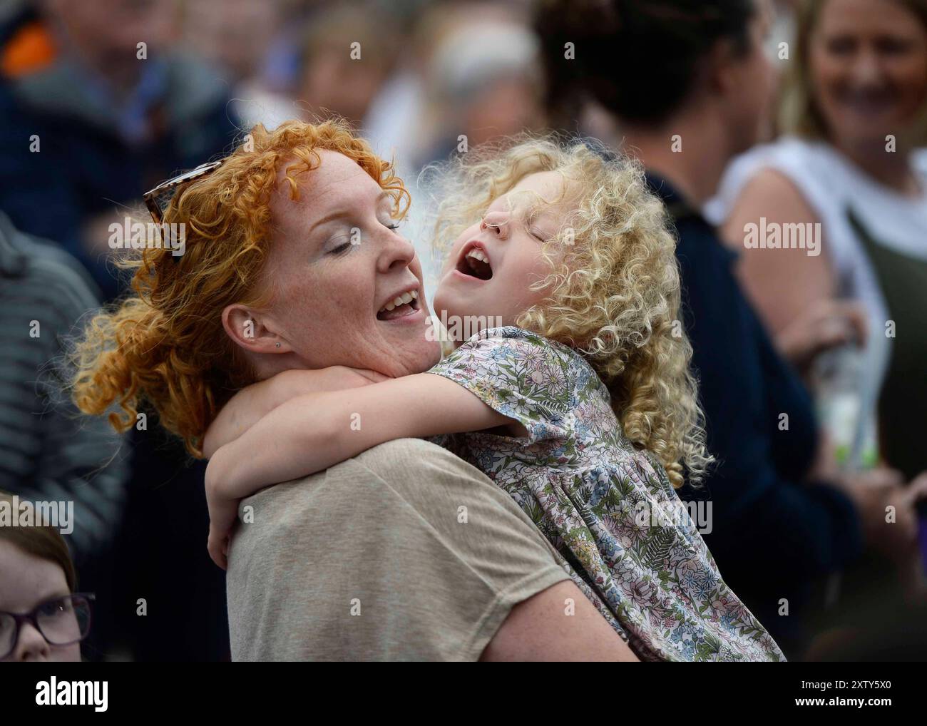 A mother and daughter celebrate as Olympic gold medalist Rhys ...