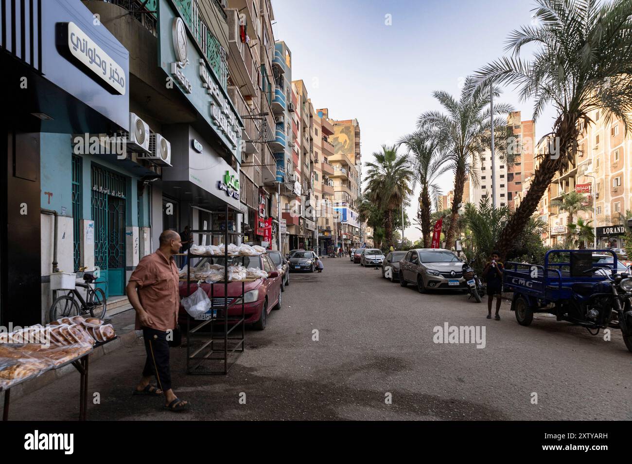 Qena city, sidewalk of main street "Qena-Safaga road M60", capital of ...