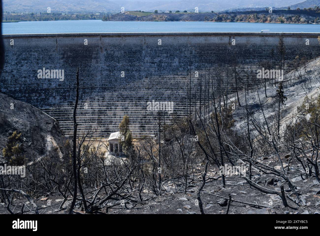 The ancient temple at the base of the Marathon dam lies among a burned ...