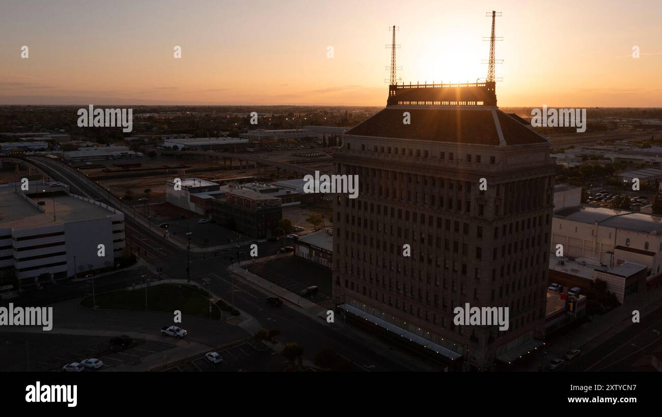 Fresno, California, USA - April 18, 2023: Sunset light shines on the ...