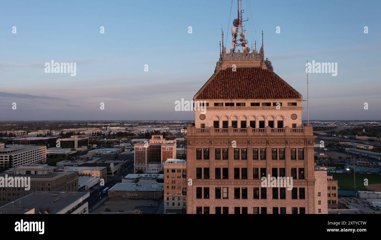 Fresno, California, USA - April 18, 2023: Sunset light shines on the ...