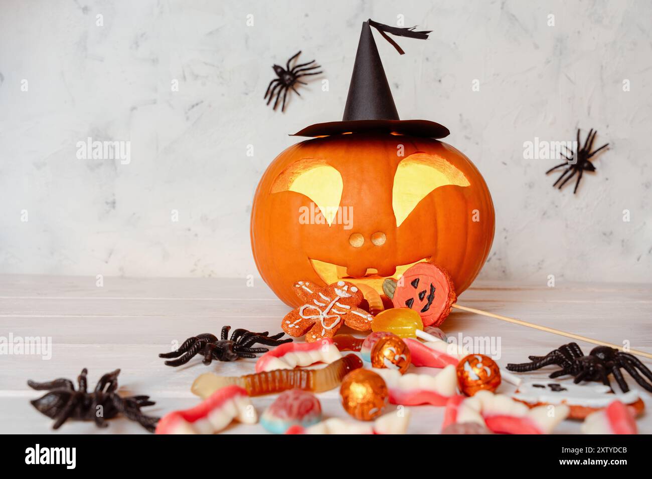 Playful Halloween carved pumpkin lantern throw up candy explosion ...