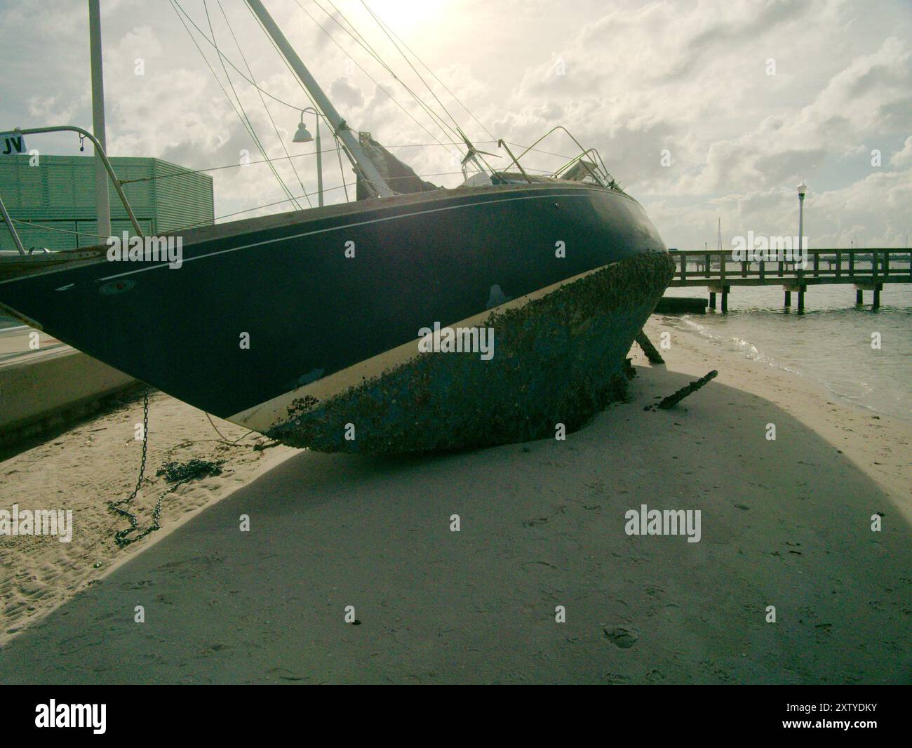 Beach sailboats after a storm at Gulfport Beach Florida. Boats and ...