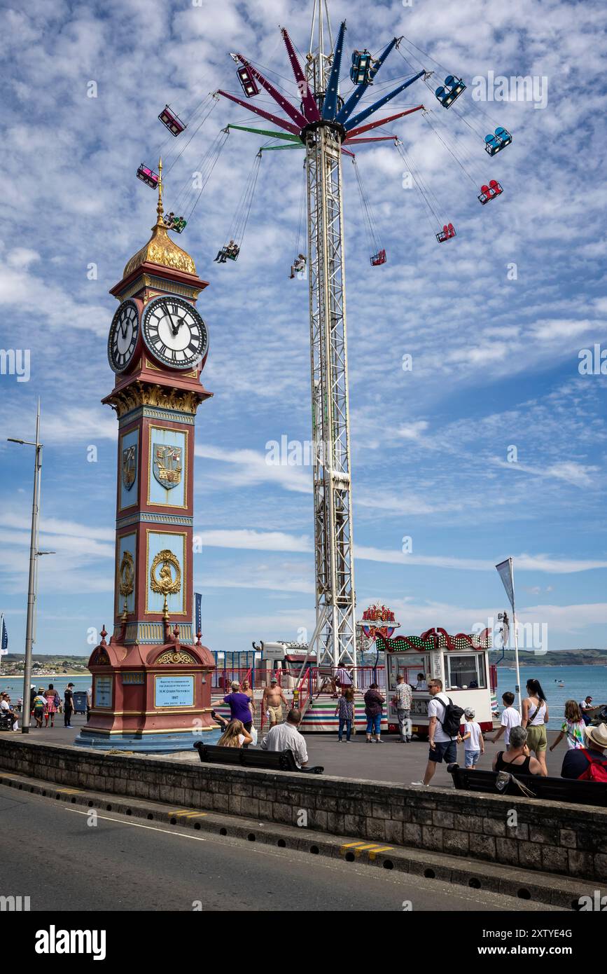 Jubilee Clock and sky carousel amusement ride on Weymouth Esplanade ...