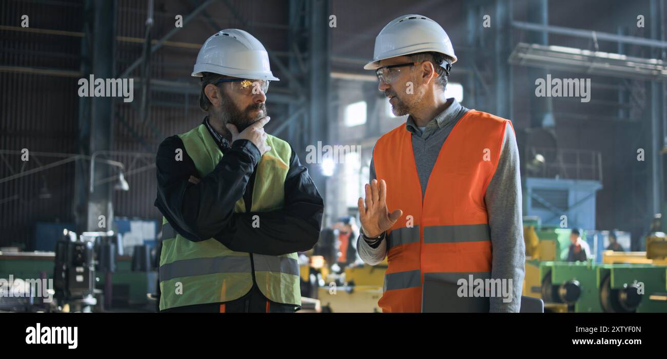 Medium shot male plant engineers hi-res stock photography and images ...