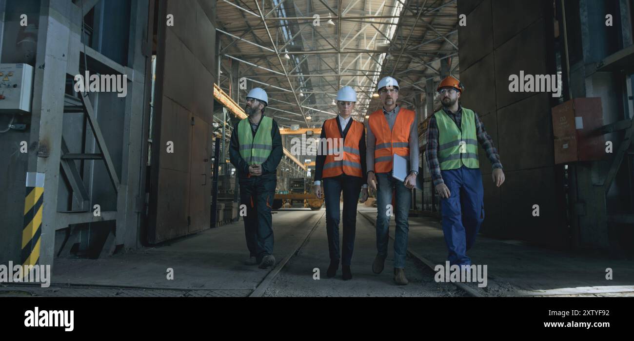 Female male engineers walking together hi-res stock photography and ...
