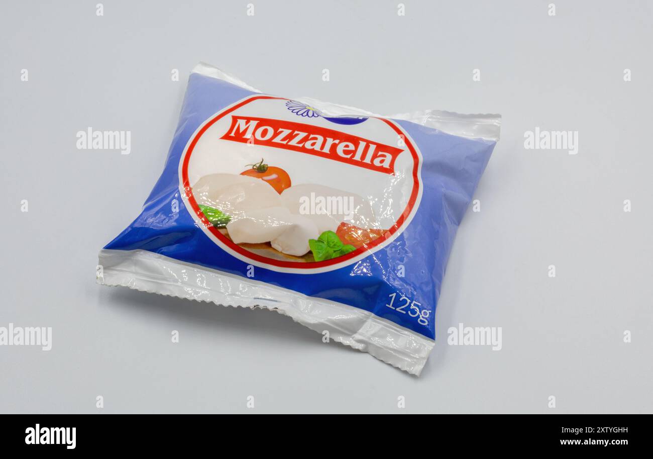Kyiv, Ukraine - September 24, 2022: Studio shoot of Mozzarella cheese package closeup against ...
