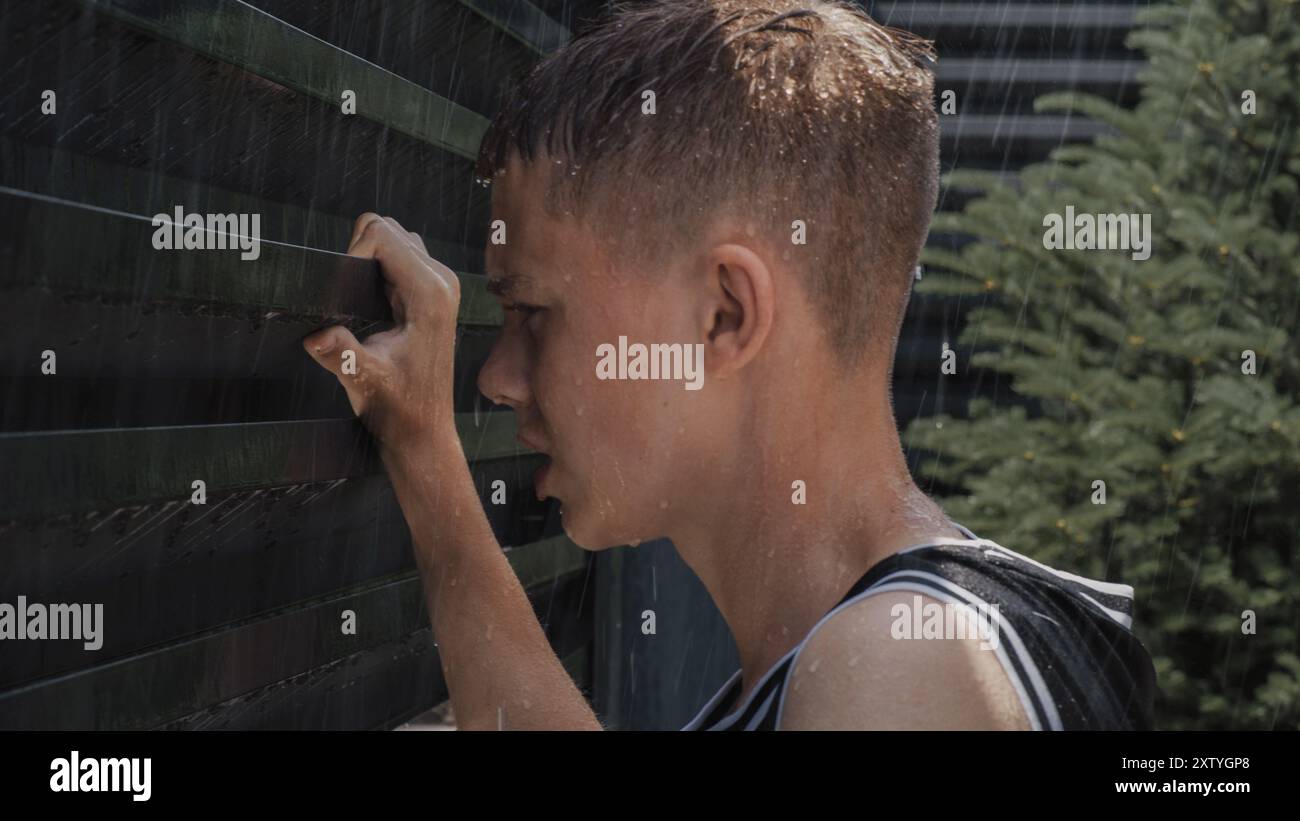 Slow motion of tired and upset Caucasian teenager breathing heavily and ...