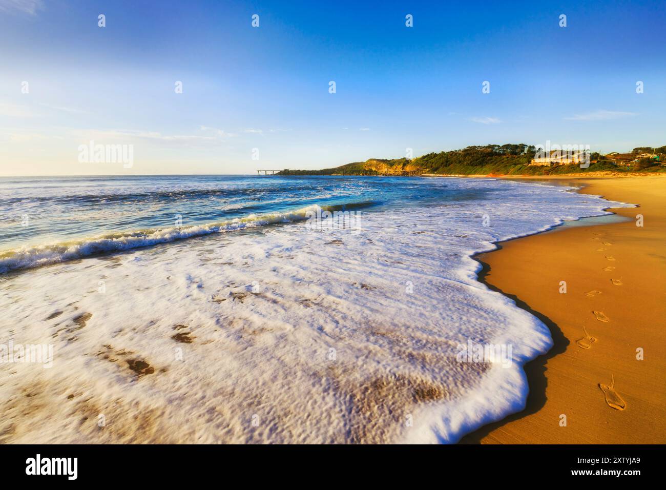 Smooth incoming wave on soft wet sand of Middle Camp beach in Catherine ...