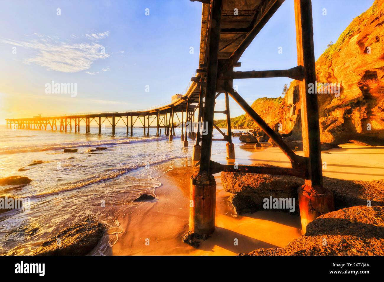 Catherine Hill bay pier jetty at Middle Camp beach on Pacific coast of ...