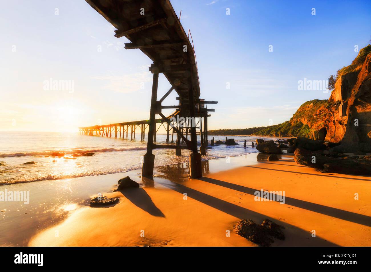 Historic timber jetty at MIddle Camp beach of Catherine HIll bay town ...