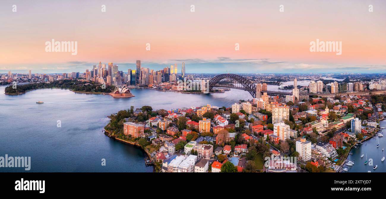 Sydney harbour waterfront of Lower North Shore and city CBD landmarks ...
