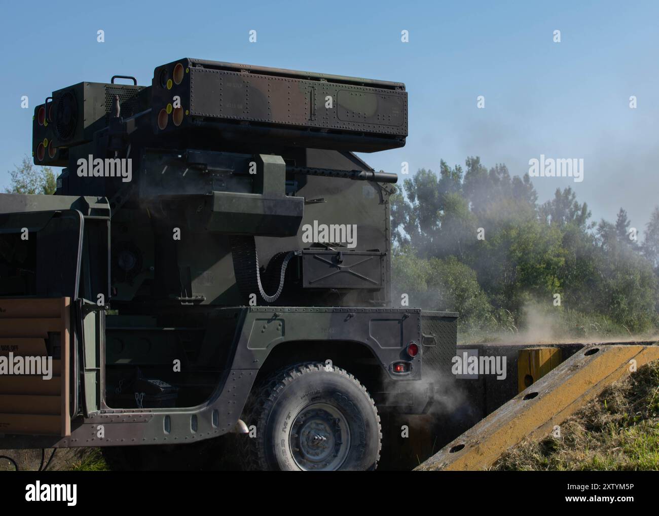 An M3P machine gun attached to an Avenger Air Defense System fires ...