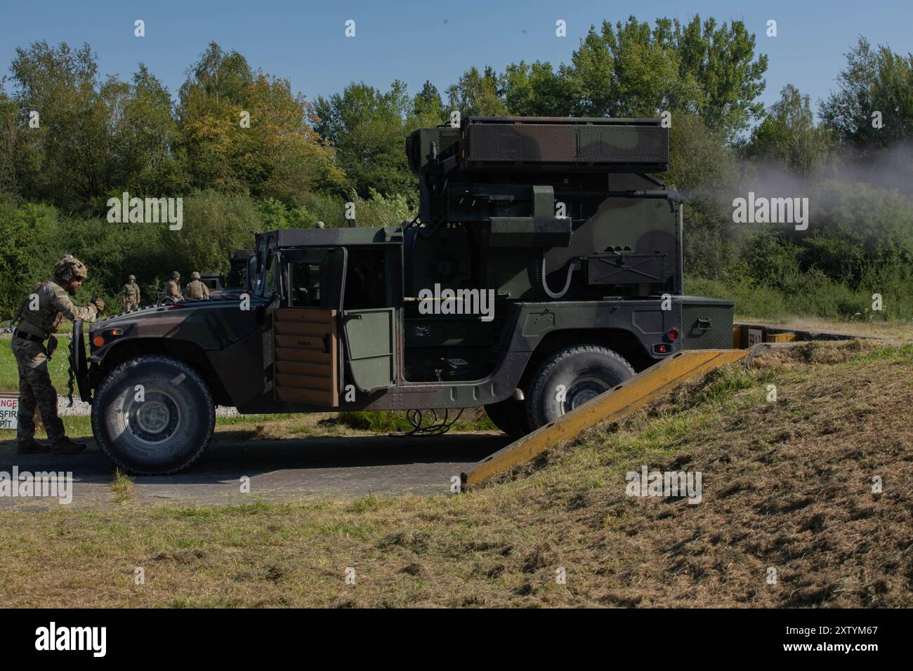 An M3P machine gun attached to an Avenger Air Defense System fires ...