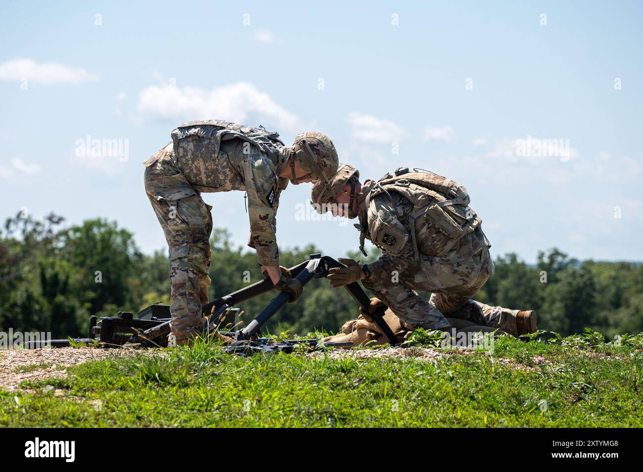 Spc. Andrew Burgess and Staff Sgt. Brandon Ratliff, with Squad 6 ...
