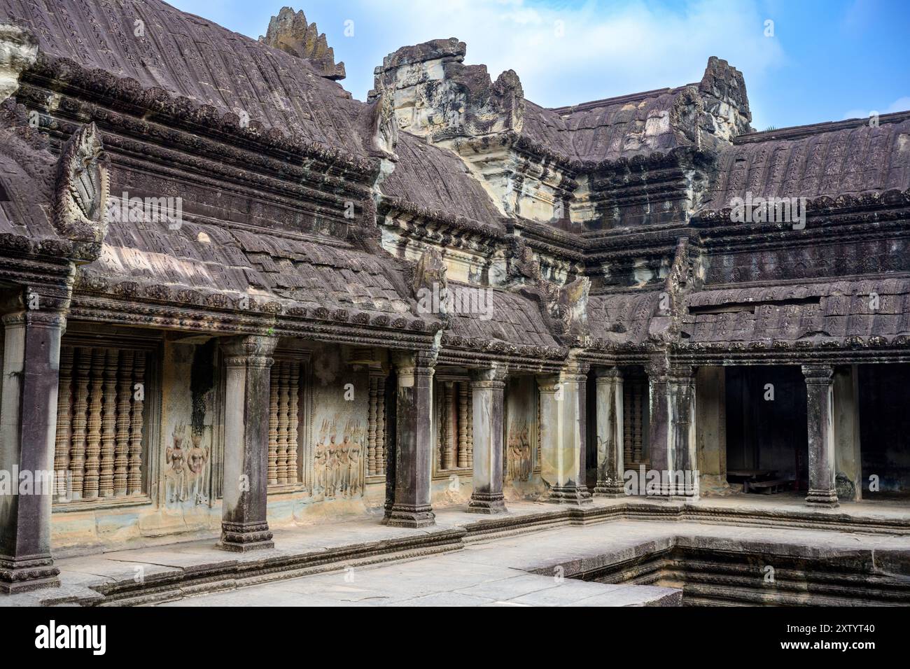 Inside of the Angkor Wat temple complex and one of the large basin ...