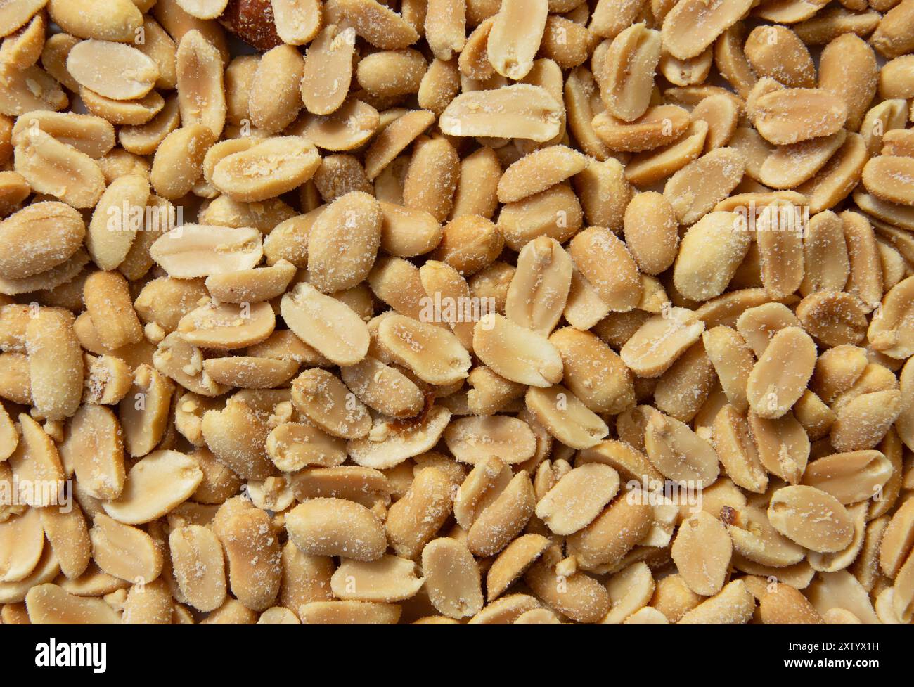 peanuts scattered on a white background Stock Photo - Alamy