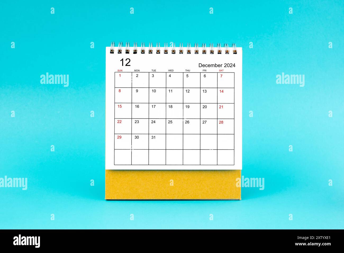 December 2024 desk calendar on blue color background Stock Photo - Alamy
