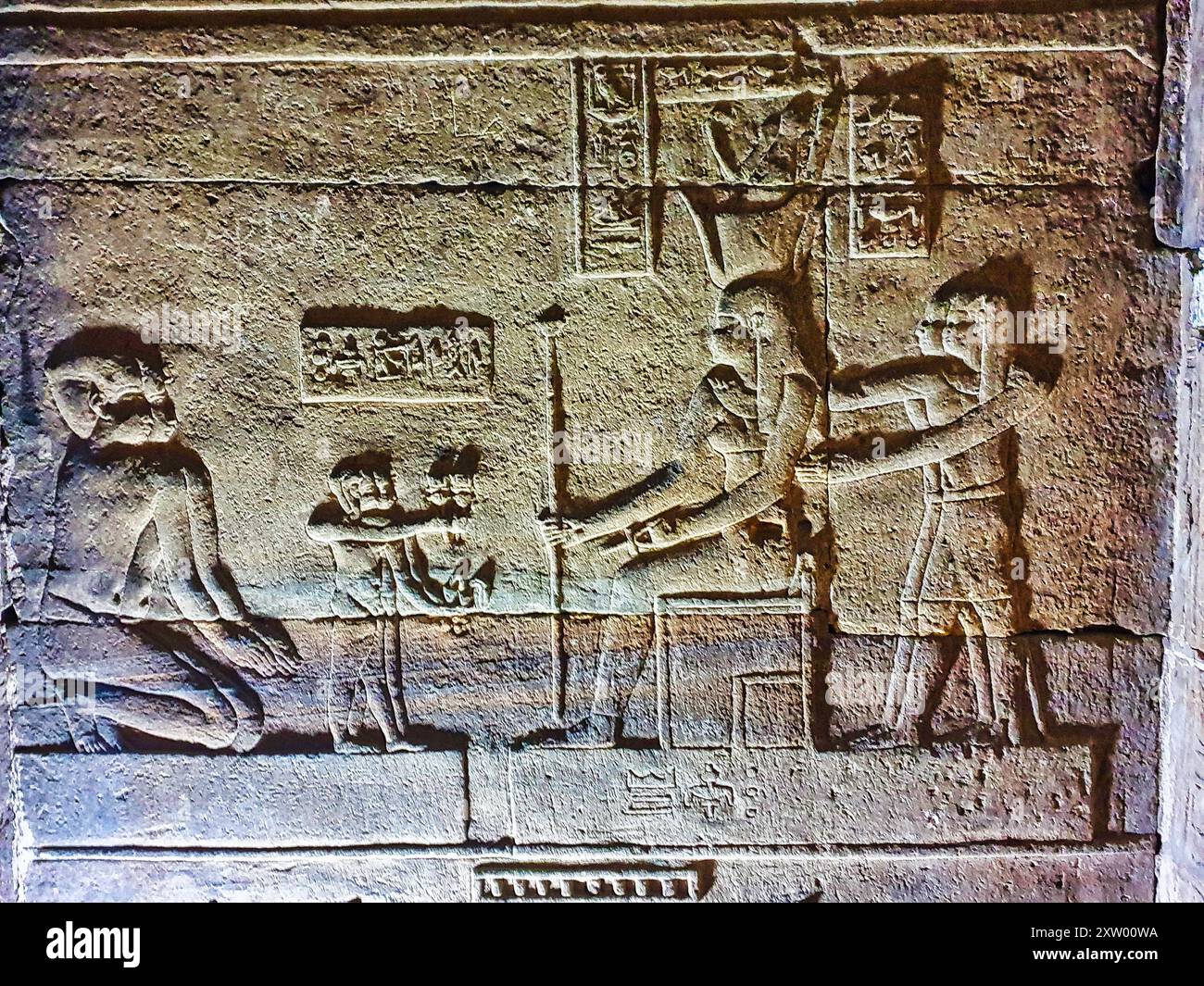 Bas relief depicting pilgrims making offerings to Goddess Hathor in the ...