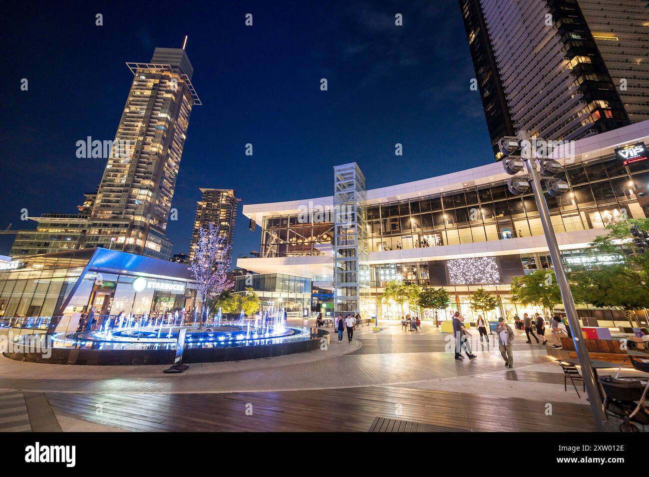 The Brentwood Place Mall, or The Amazing Brentwood main plaza on a summer evening with stores ...