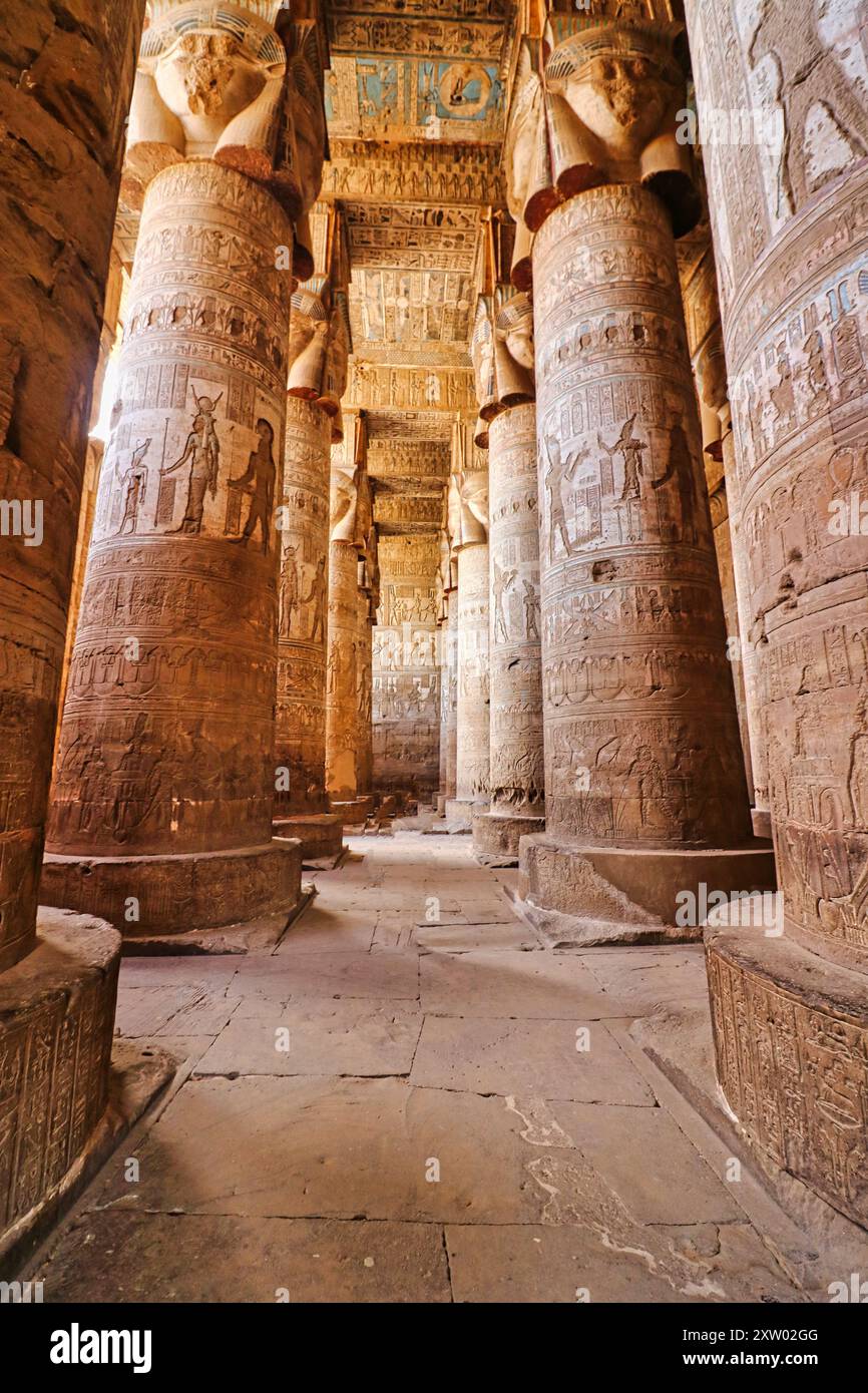 Beautiful limestone pillars topped by faces of Hathor and vibrant ...