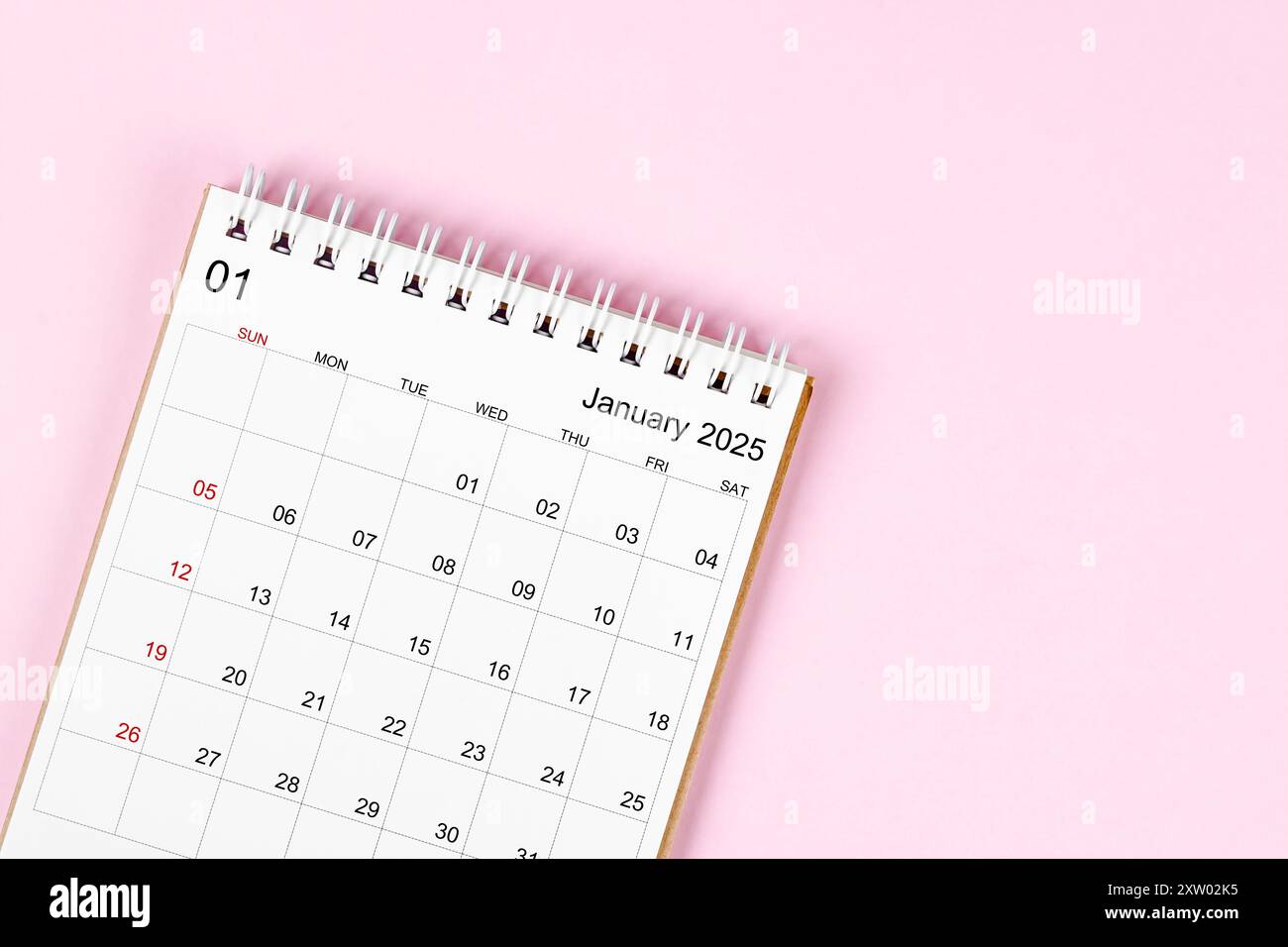 January 2025 desk calendar on pink color background, Position with ...
