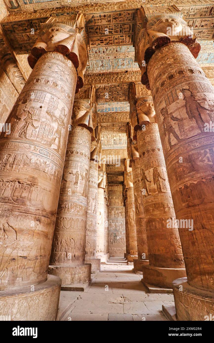 Majestic hypostyle columns topped by faces of Hathor and vibrant ...
