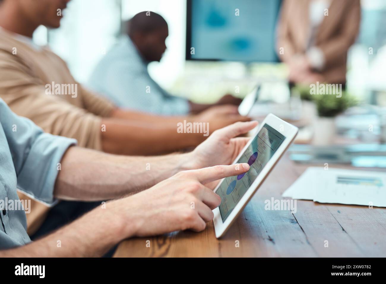 Finger, infographic and tablet with business person at table in ...