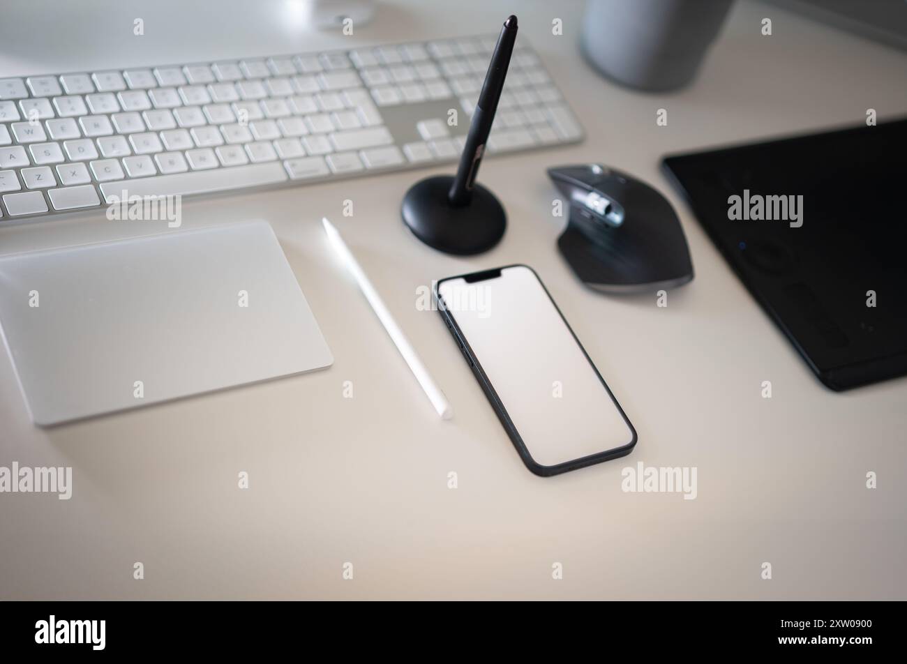Electronic devices. Smartphone blank screen mockup. White table ...