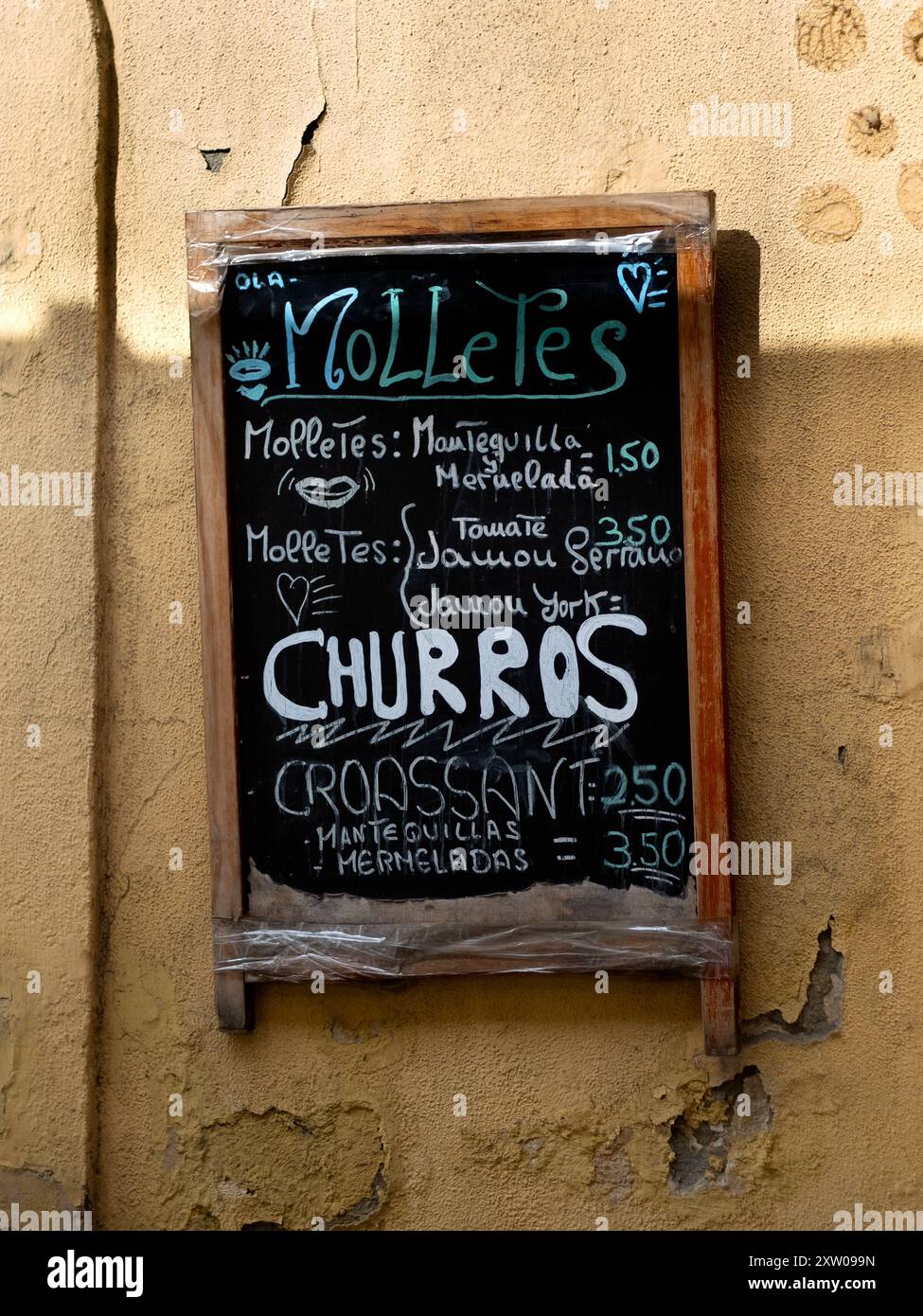 CADIZ, SPAIN - MAY 23, 2024: Blackboard menu outside small Cafe in the ...