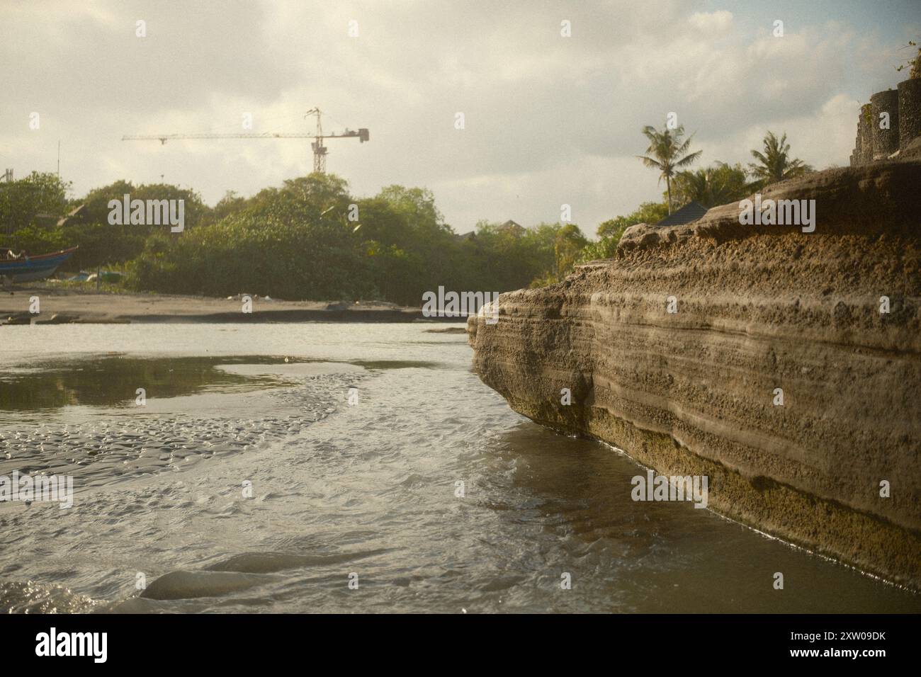 Alluvium along the riverbank is affected by river current abrasion and the construction of tall ...