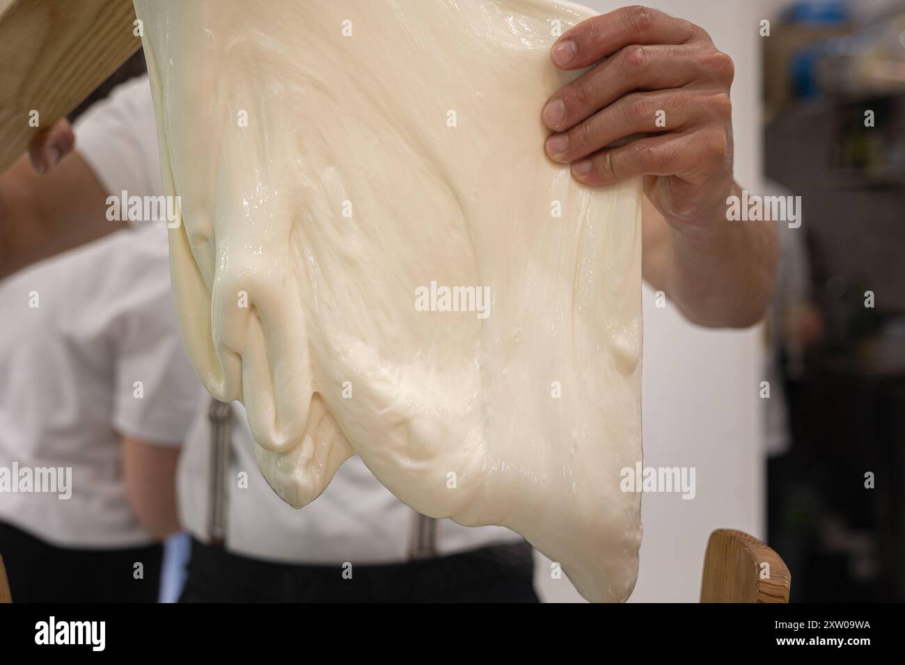 Production and Manual Production of Italian Mozzarella Stock Photo - Alamy