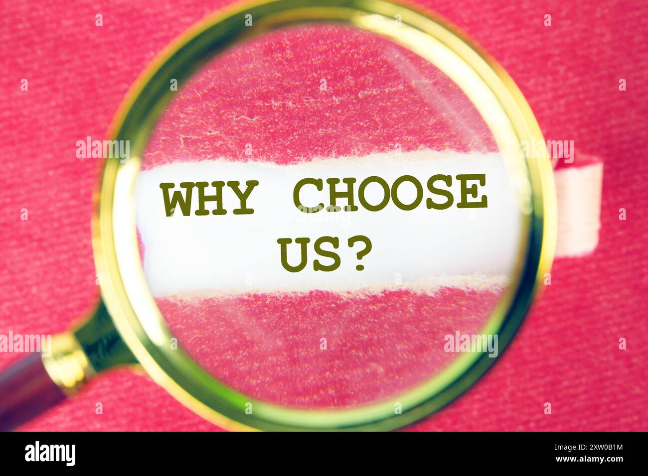 Why choose us written through a magnifying glass under a torn paper ...