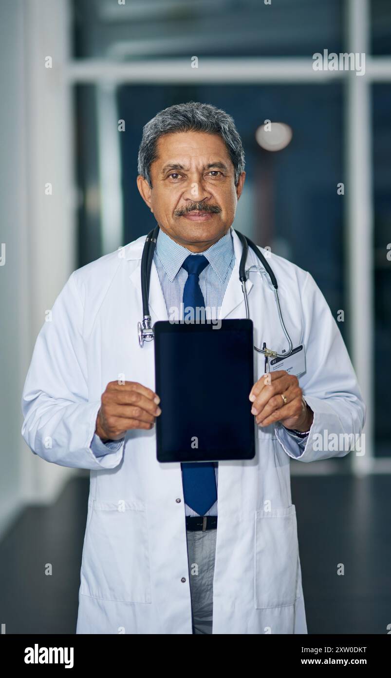 Mature doctor, portrait and screen of tablet for hospital schedule ...