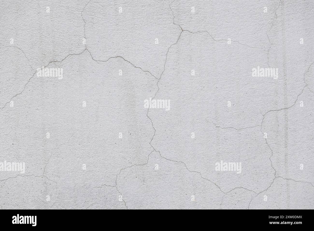 Cracks in walls after plastering and painting. White painted plaster ...