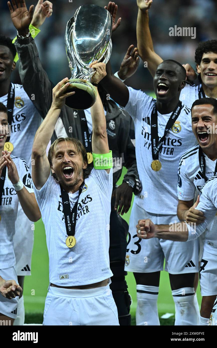 WARSAW, POLAND - AUGUST 14: Luka Modric of Real Madrid with a trophy ...